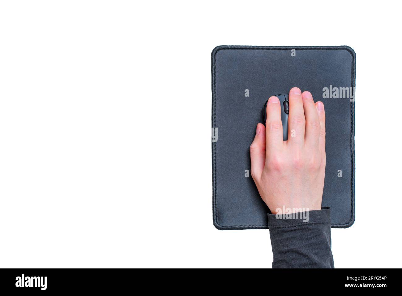 Top view of a male hand placed on top of a wireless computer mouse set ...