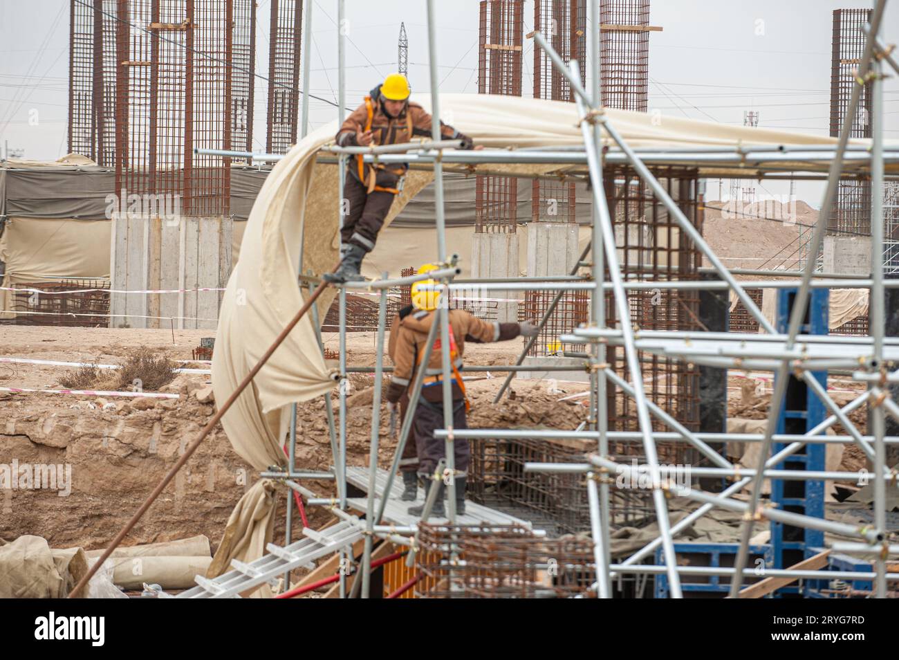 A workers with special equipment in a construction site make formwork ...