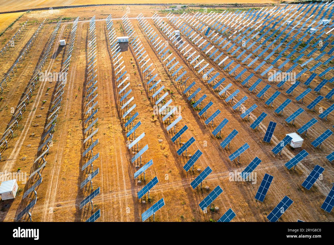 Aerial view of a solar power station and solar energy panels in a rural ...