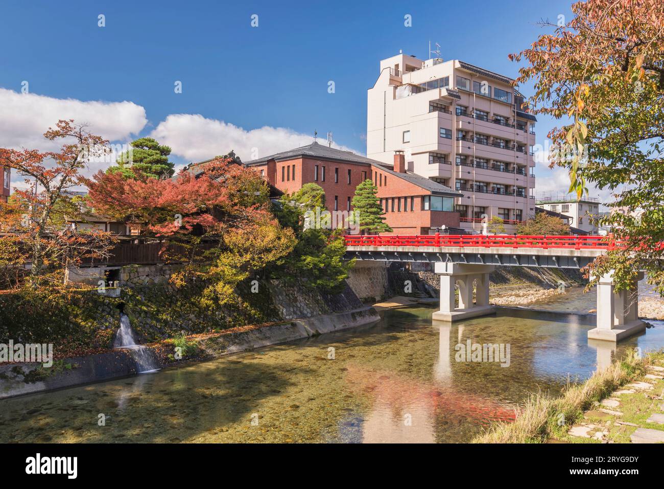 Takayama Japan, autumn landscape foliage at red Nakabashi bridge and ...