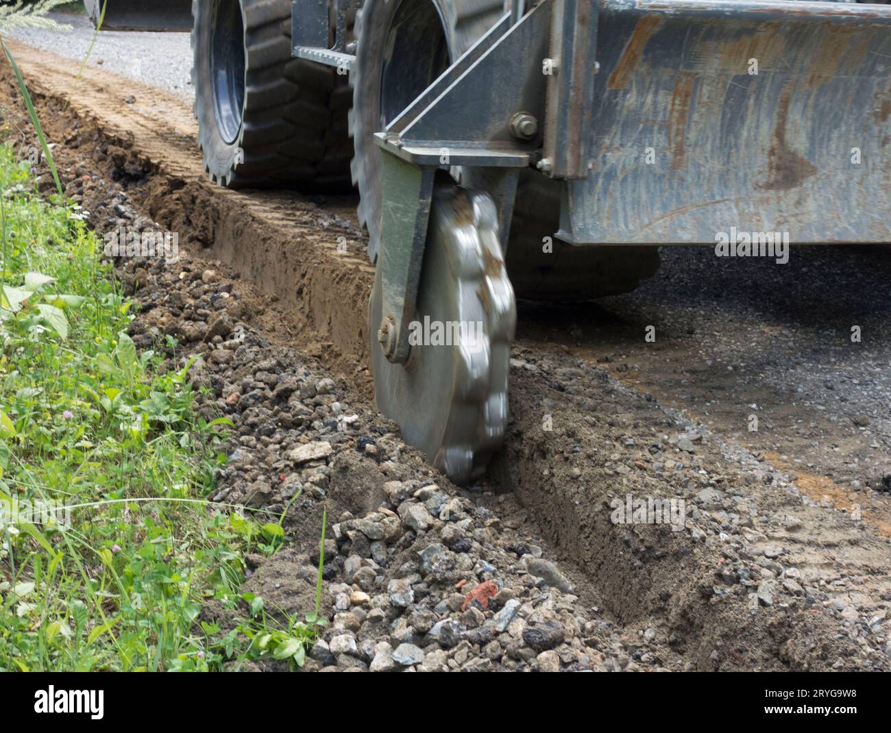 Laying fiber optic cable with a molding cutter Stock Photo - Alamy