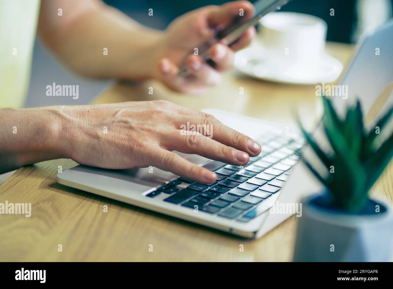 Mans hand working on laptop hi-res stock photography and images - Alamy