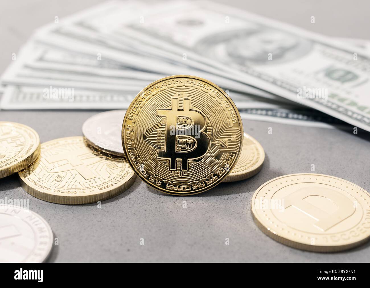 Bitcoin coin, crypto coins and US dollar banknotes. Crypto business ...