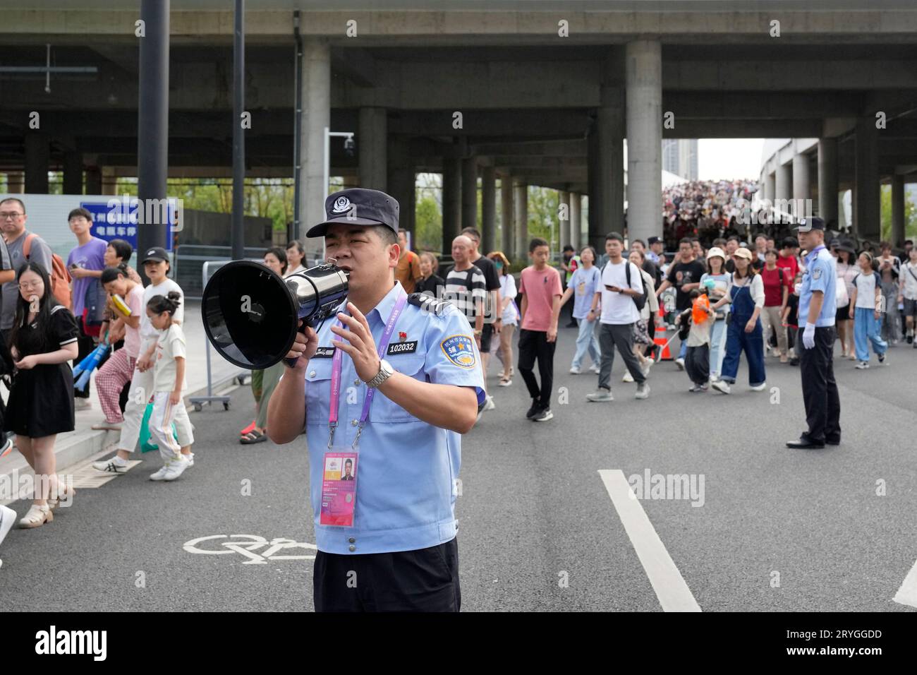Police try to control the crowd outside the venue of the 19th Asian ...