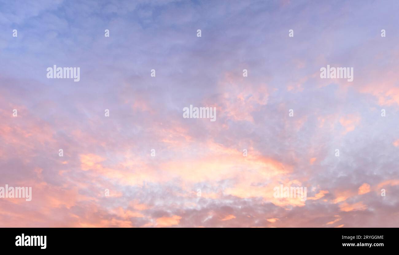 Wild, fiery evening sky with clouds just before sunset Stock Photo - Alamy