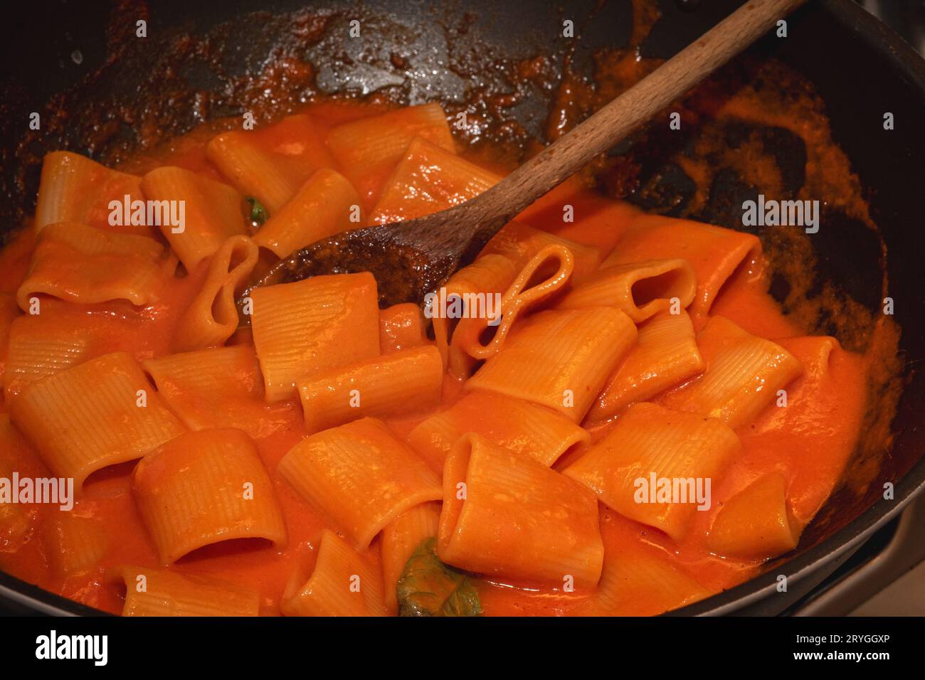Italian Paccheri Pasta With Three Tomato Types Stock Photo - Alamy