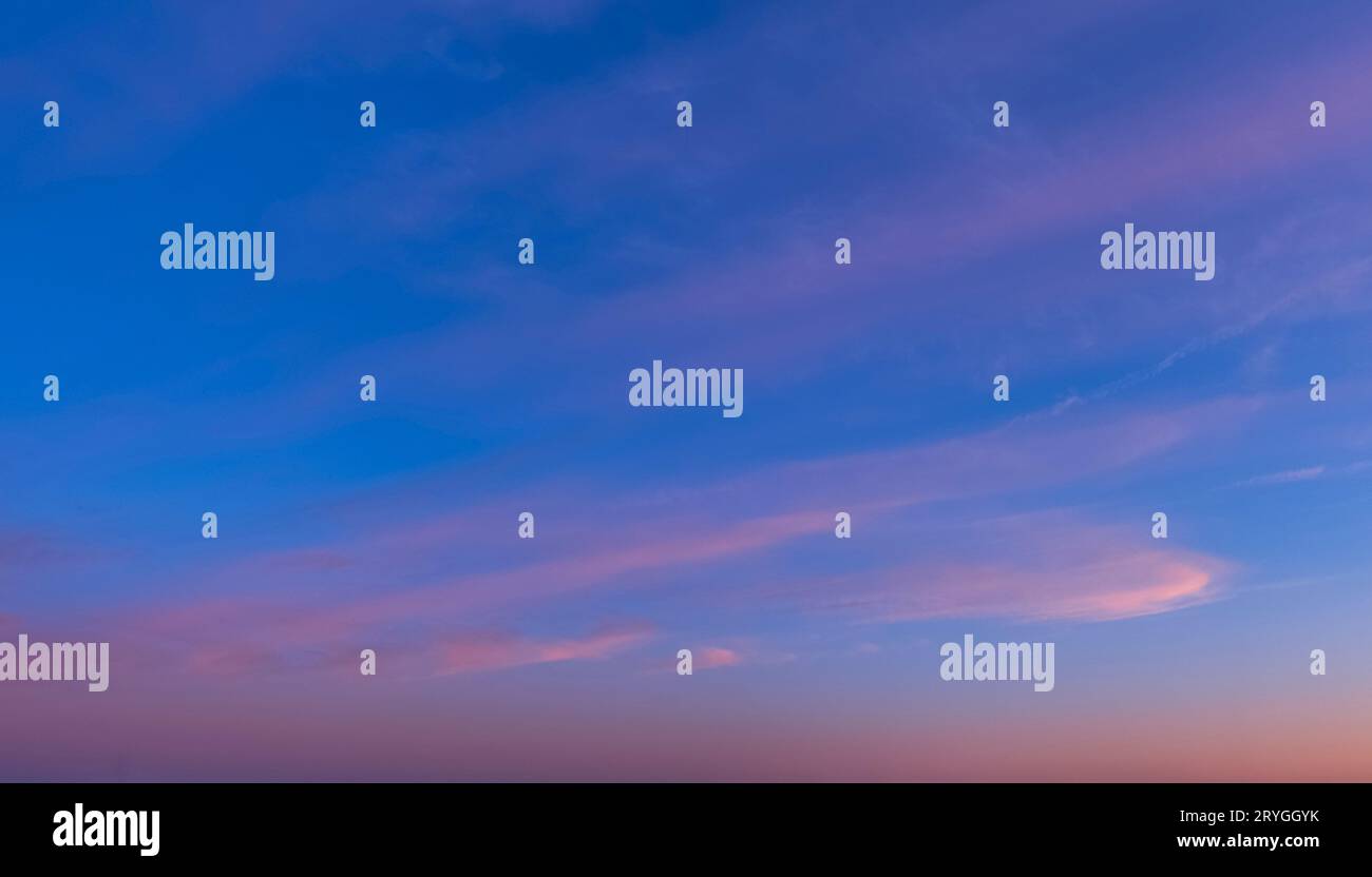 Wild, fiery evening sky with clouds just before sunset Stock Photo - Alamy