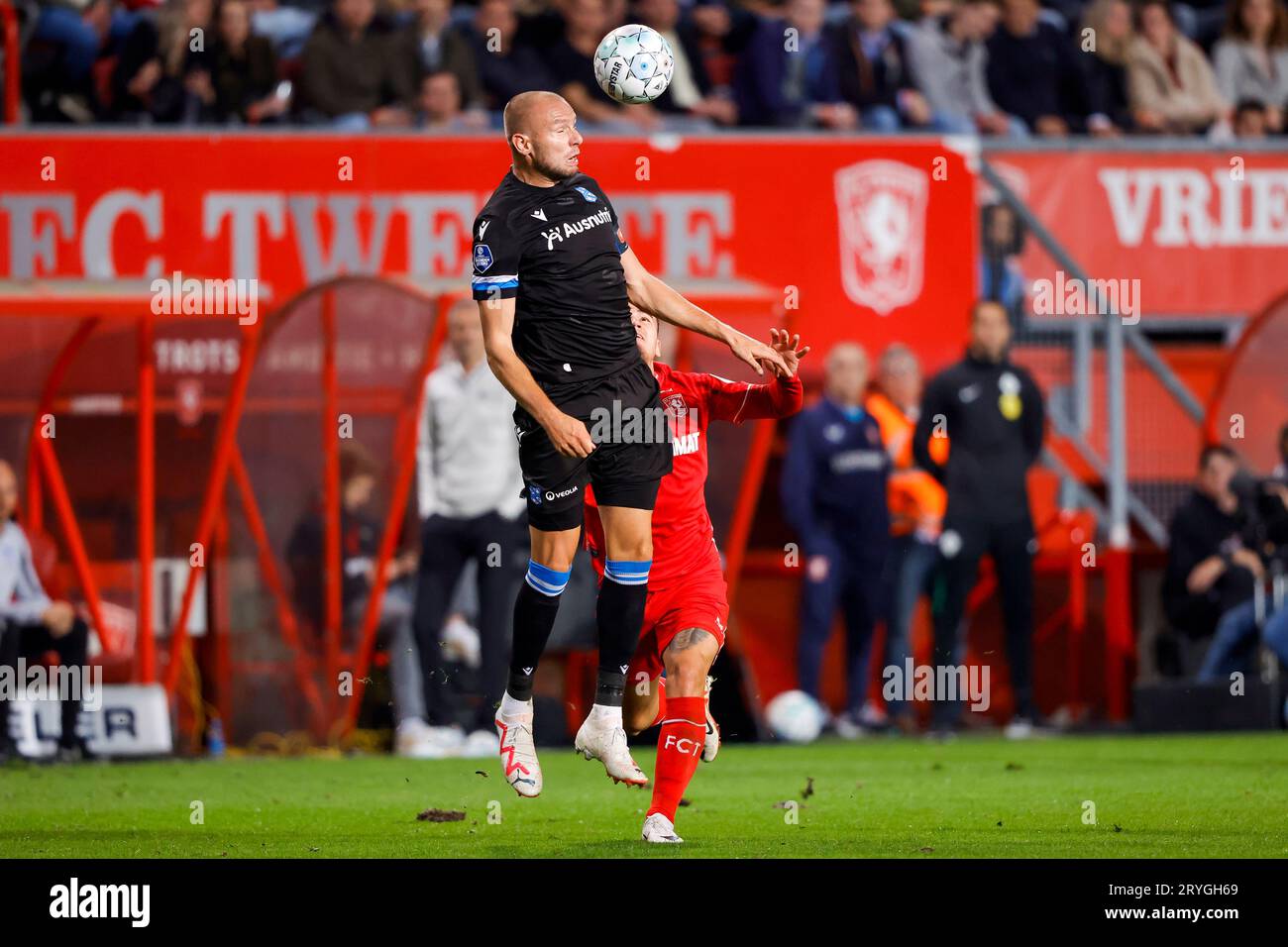 ENSCHEDE, NETHERLANDS - SEPTEMBER 30: Manfred Ugalde (FC Twente) and Sven van Beek (SC ...
