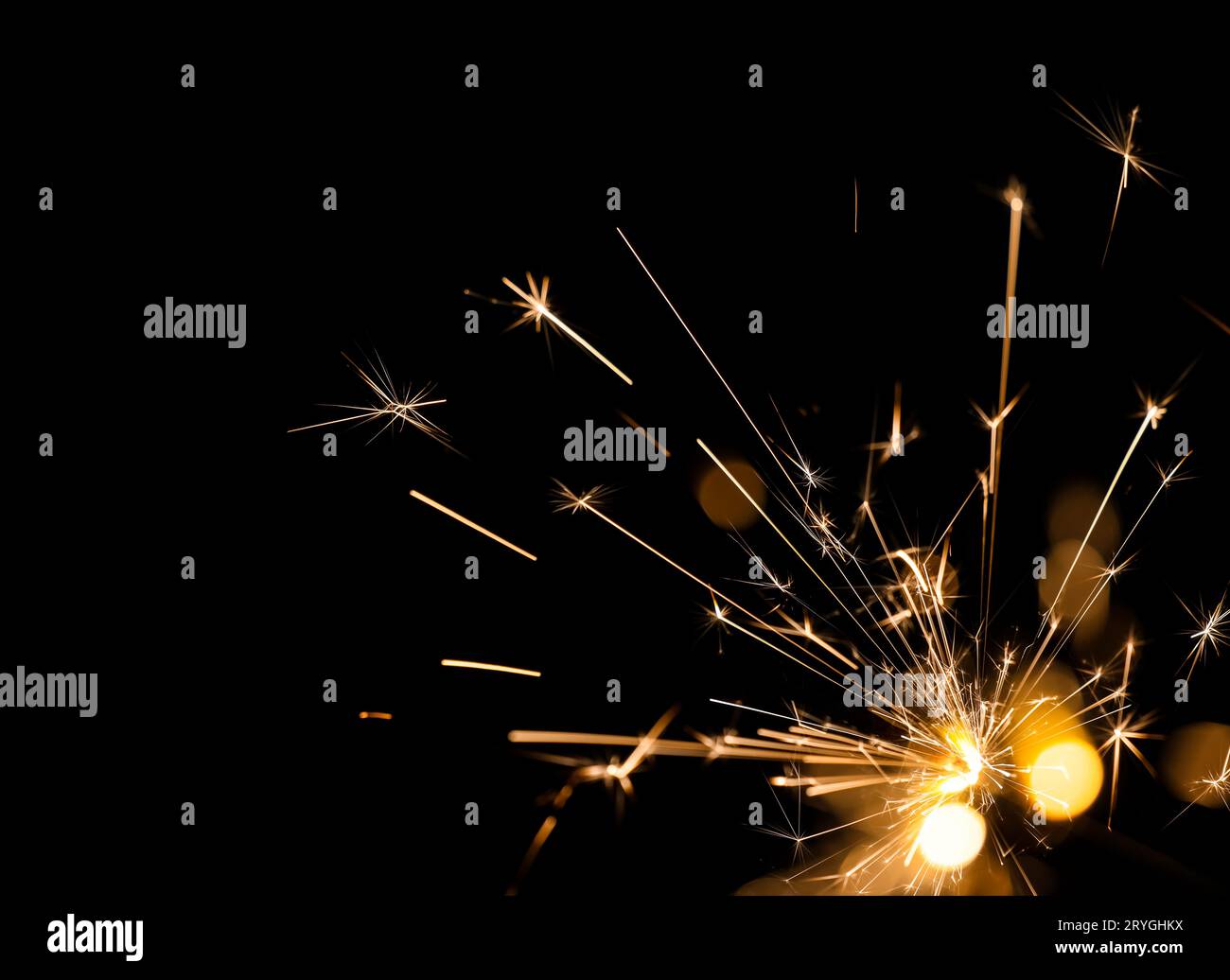 Close up firework sparklers over black Stock Photo - Alamy