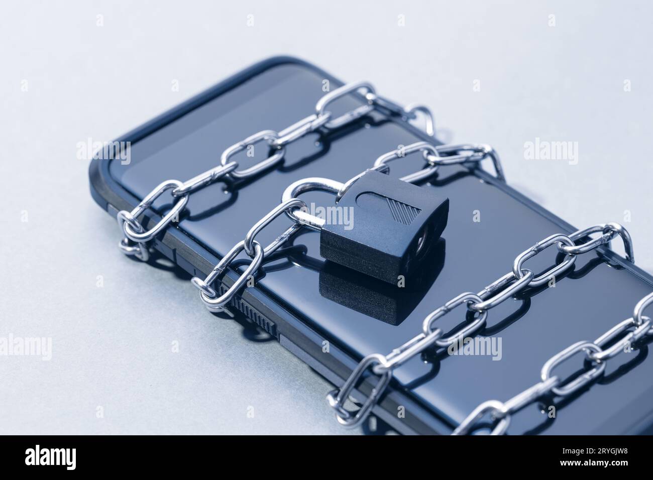 Phone security and data privacy concept. Smartphone locked with chain ...