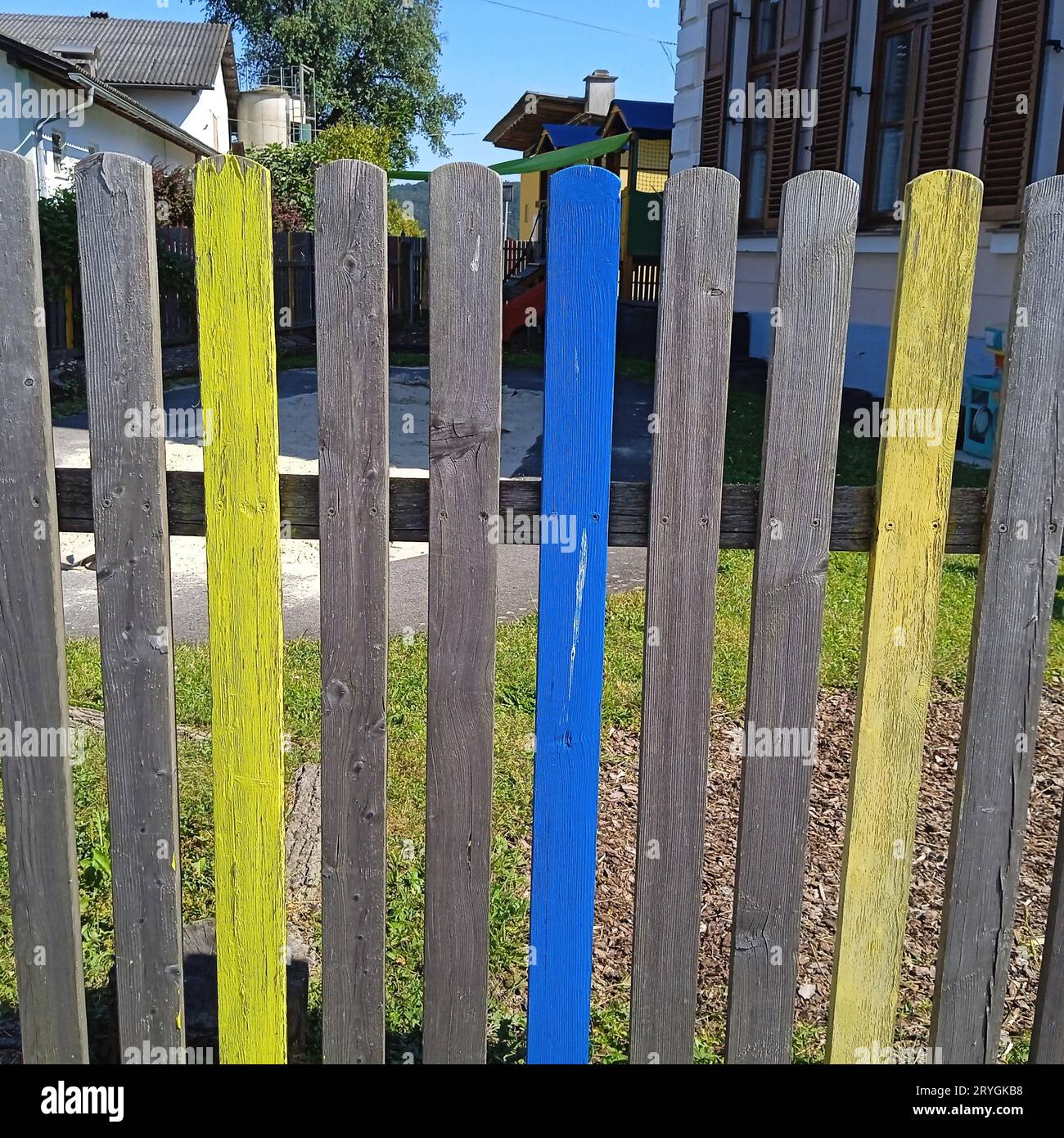 Wooden fence as demarcation to other land Stock Photo - Alamy