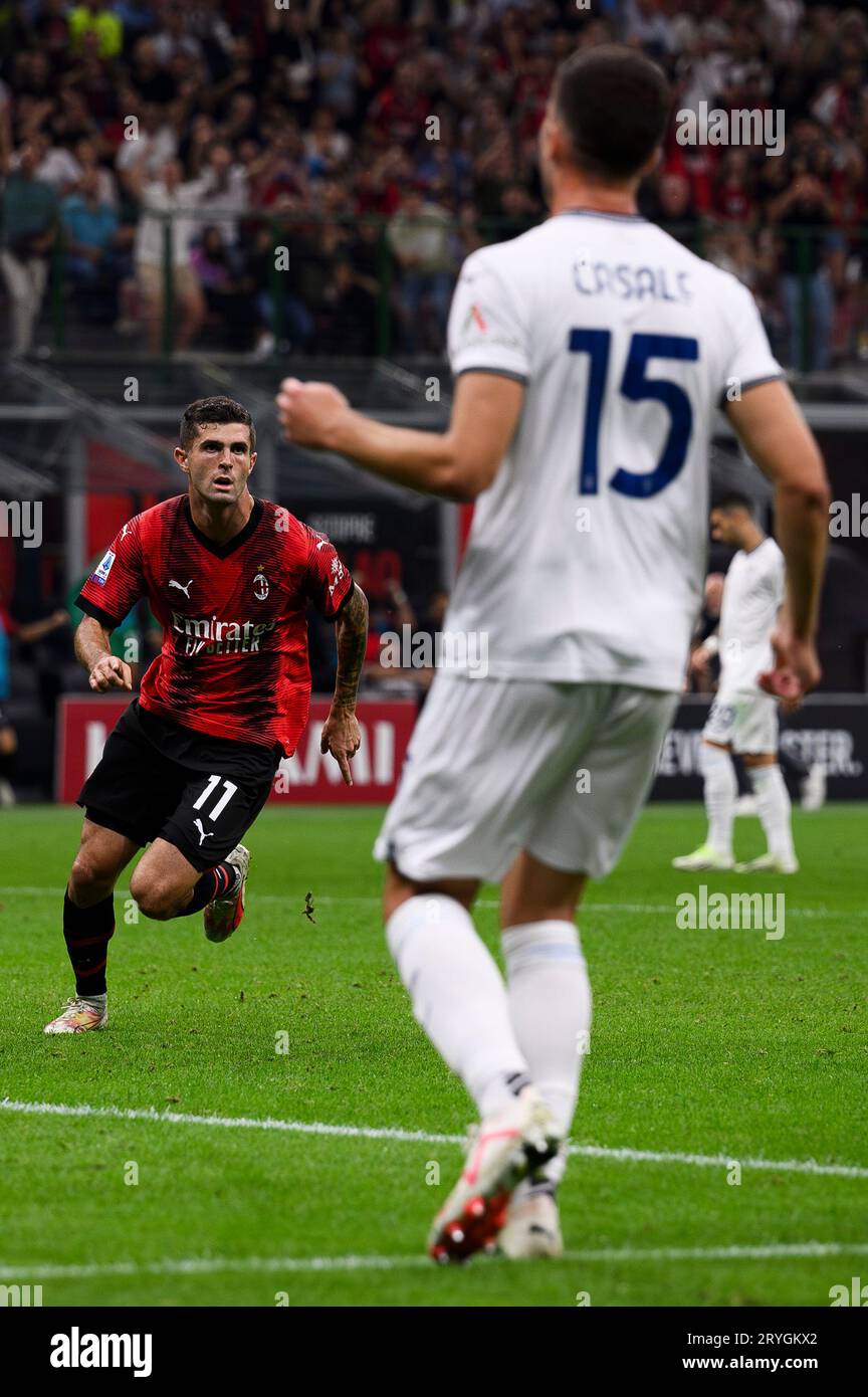 Christian Pulisic of AC Milan celebrates after scoring the opening goal ...