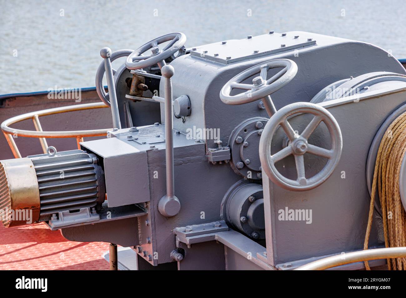 Closeup of levers, steering wheels, anchor windlass machine and heavy ...