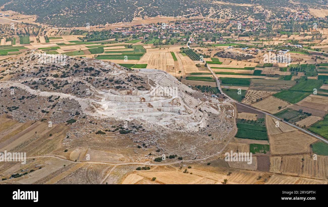 Mountains destroyed by marble quarries. Burdur Yarışlı Lake in Turkey ...