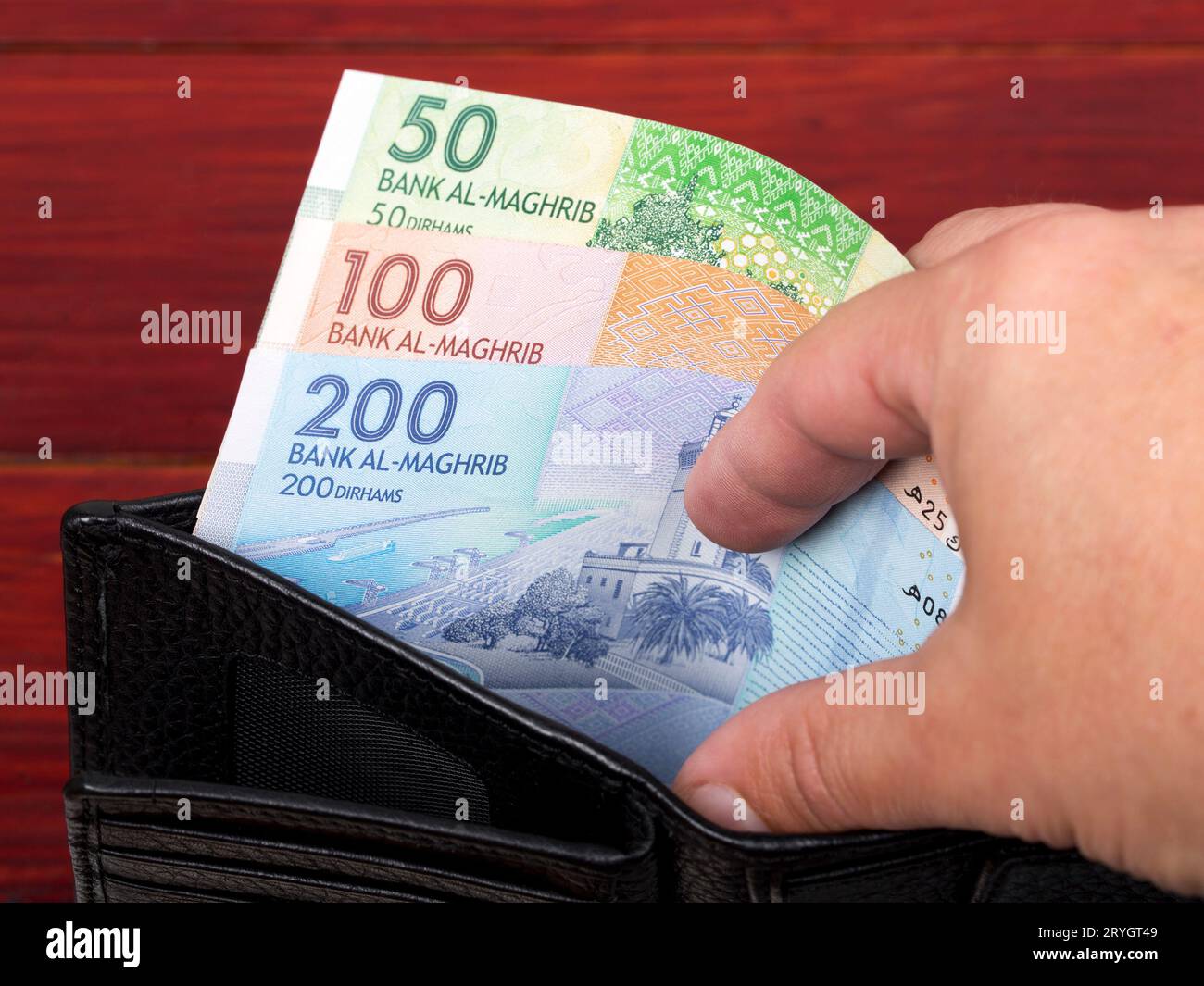 Moroccan money - Dirham in the black wallet Stock Photo - Alamy
