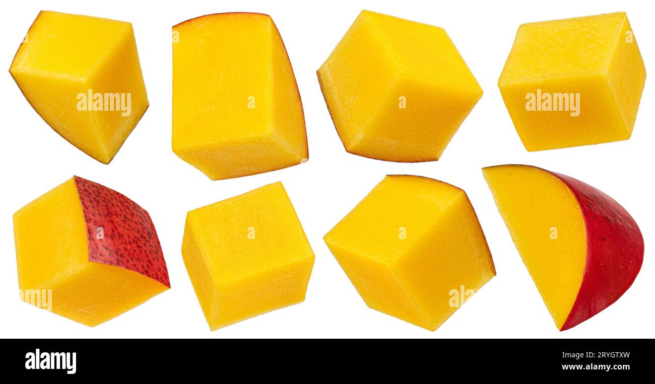 Mango cube slices isolated on white background Stock Photo - Alamy