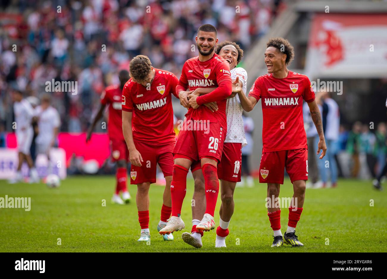 Cologne, Germany. 30th Sep 2023. Schlussjubel: Deniz Undav (VfB) wird von Jamie Leweling (VfB ...