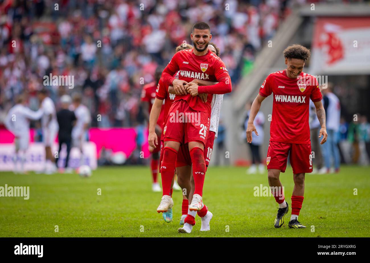 Cologne, Germany. 30th Sep 2023. Schlussjubel: Deniz Undav (VfB) wird von Jamie Leweling (VfB ...
