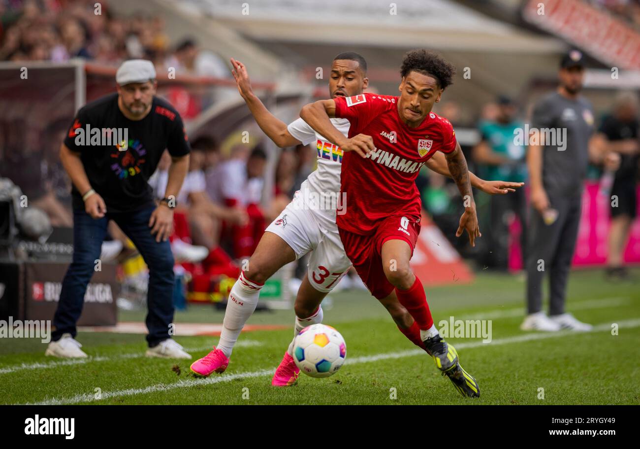 Cologne, Germany. 30th Sep 2023. Enzo Millot (VfB), Linton Maina (Köln) 1. FC Köln - VfB ...