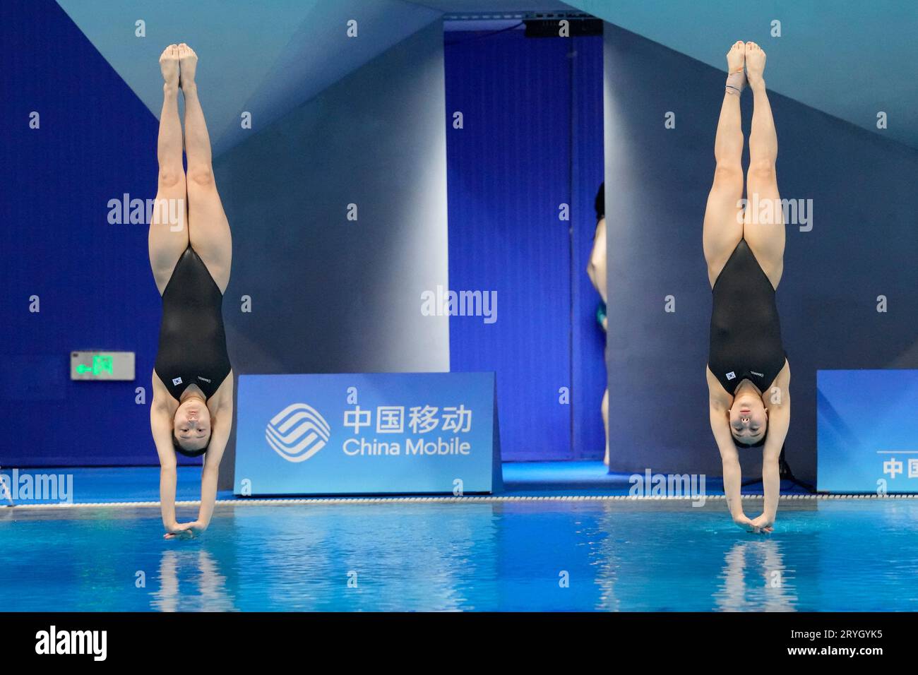 Singapore's Kay Yian Fong and Ashlee Yi Xuan Tan compete during the ...