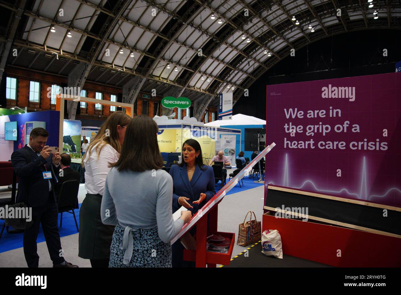 Former home secretary Dame Priti Patel (centre), speaks with stall ...
