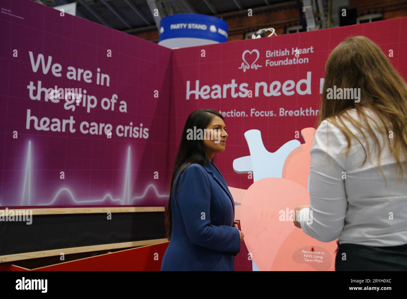 Former home secretary Dame Priti Patel, speaks with stall holders in ...