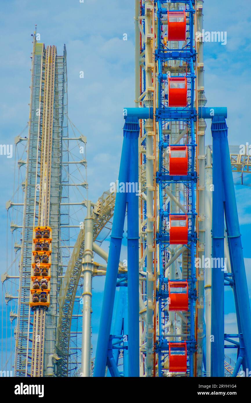 Ferris wheel and roller coaster Stock Photo - Alamy