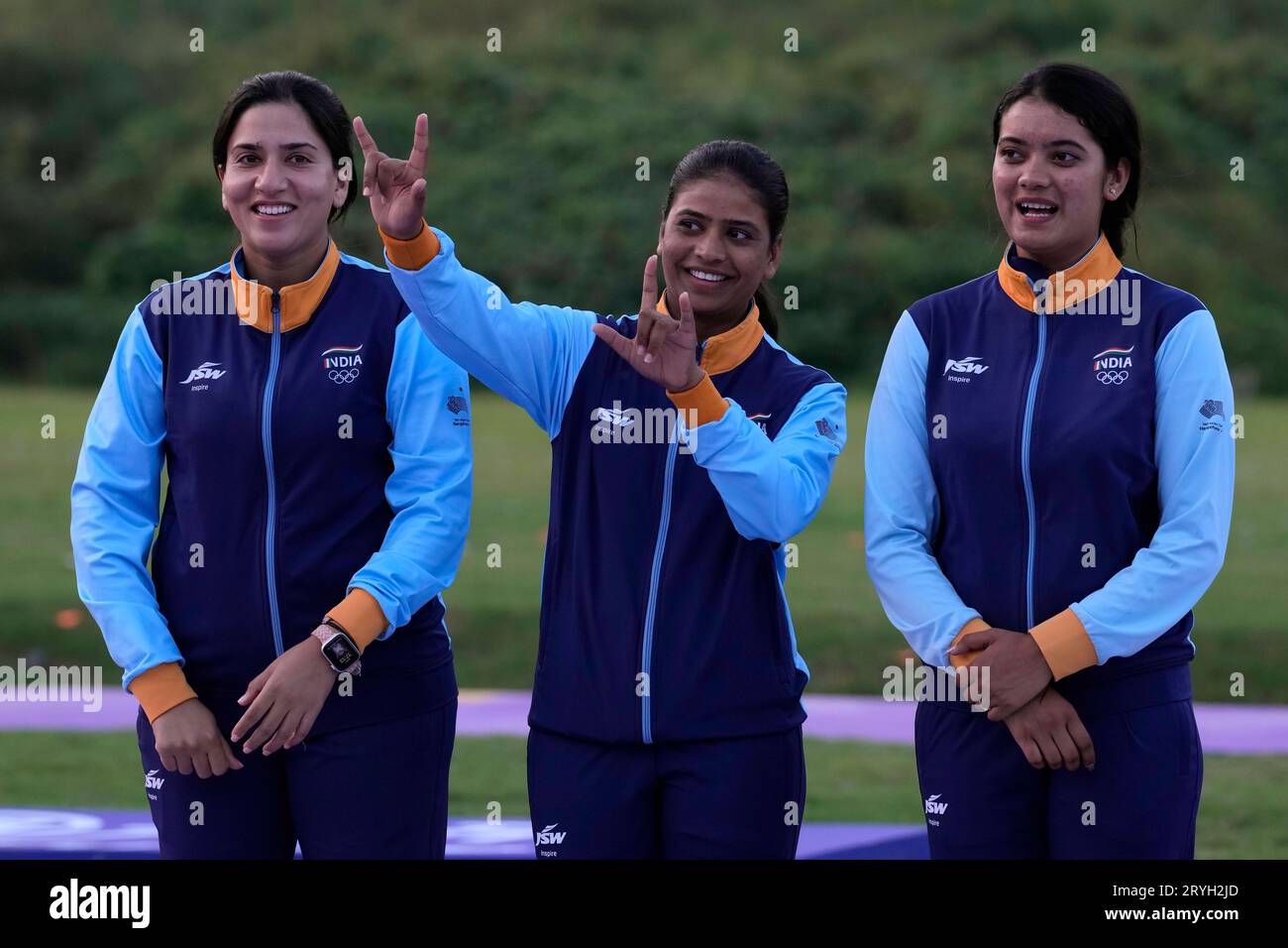 From left, silver medalists India's Rajeshwari Kumari, Manisha Keer and ...