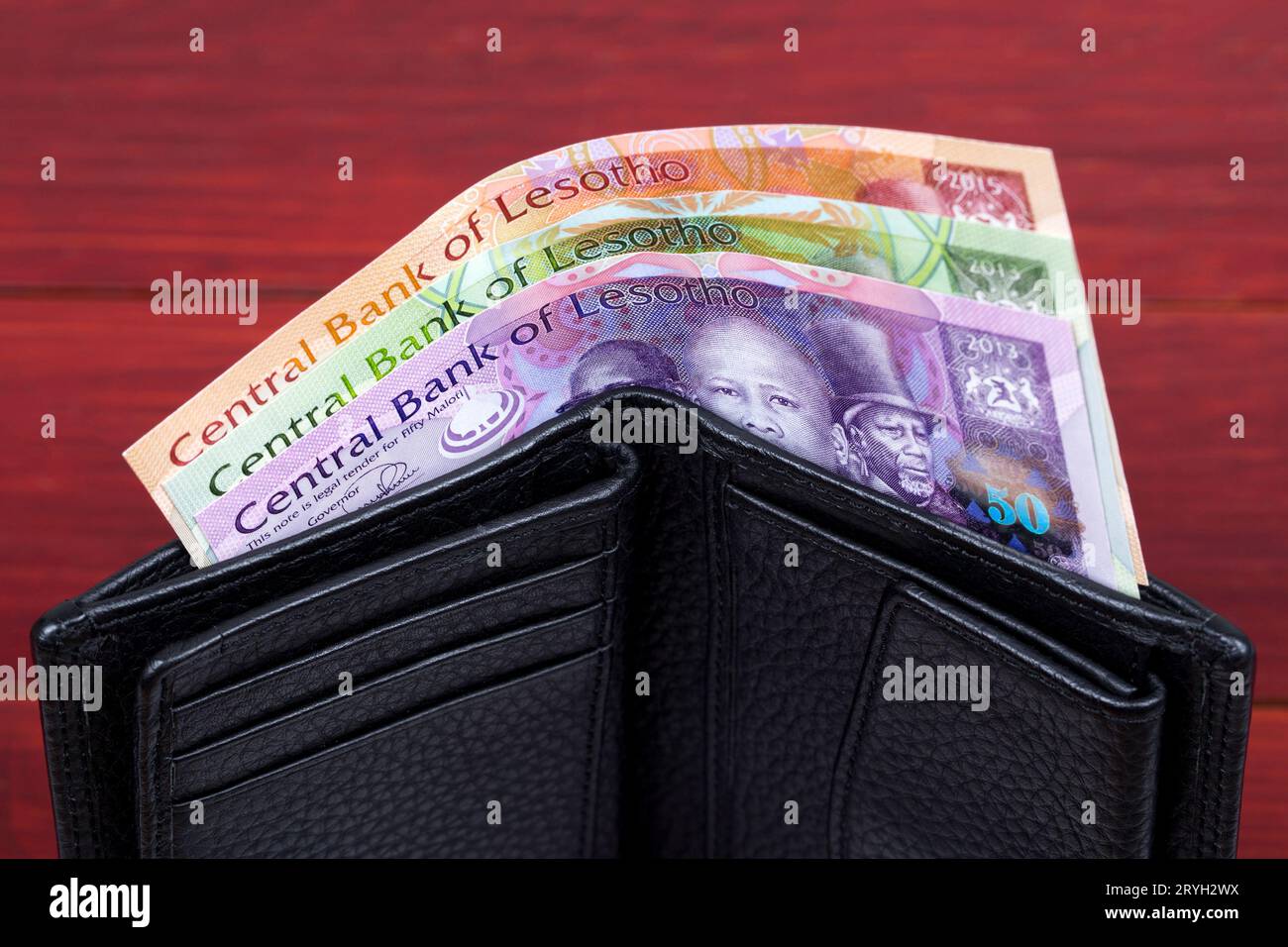Lesotho money - Loti in the black wallet Stock Photo - Alamy
