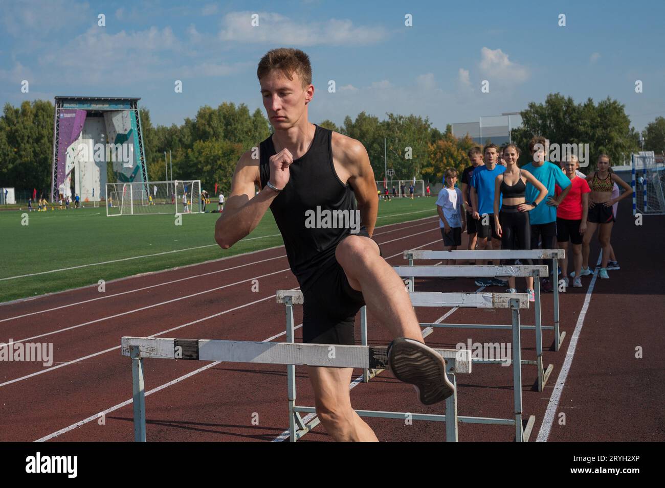 Hurdles competition man hi-res stock photography and images - Alamy