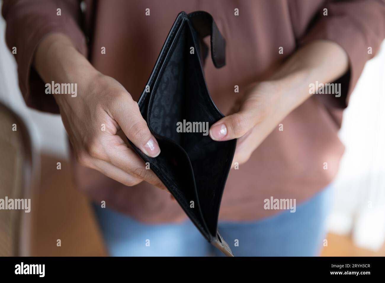 Crop close up Indian woman holding empty wallet in hands Stock Photo ...