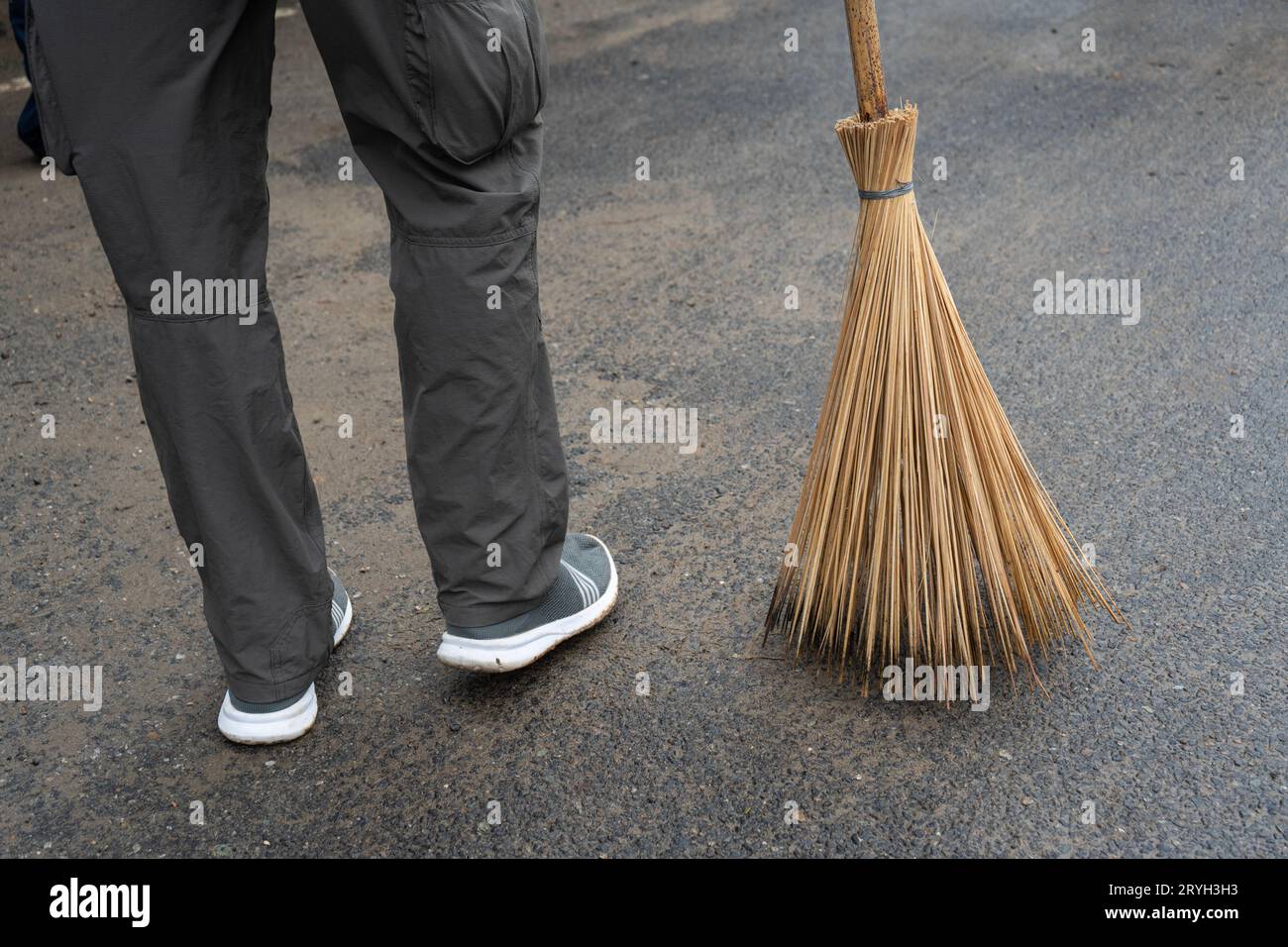 Volunteers of Indian Oil Corporation cleans garbage near a road as they ...