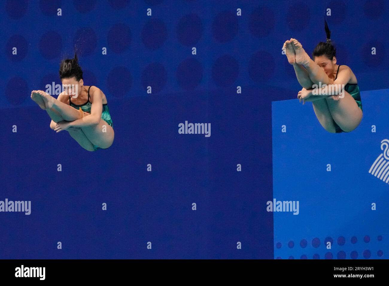 Singapore's Kay Yian Fong and Ashlee Yi Xuan Tan compete during the ...