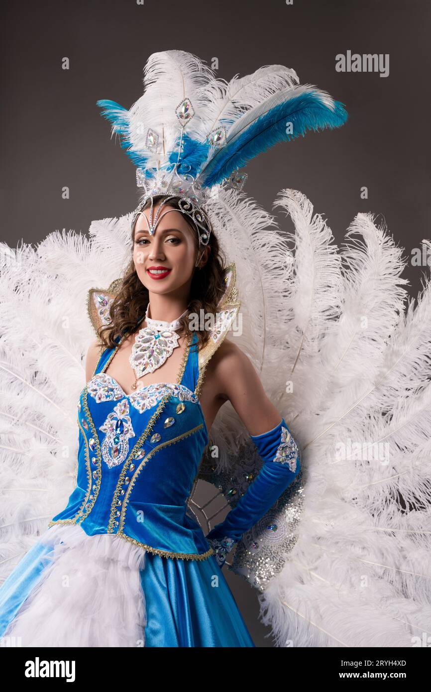 Woman glance feathers hi-res stock photography and images - Alamy