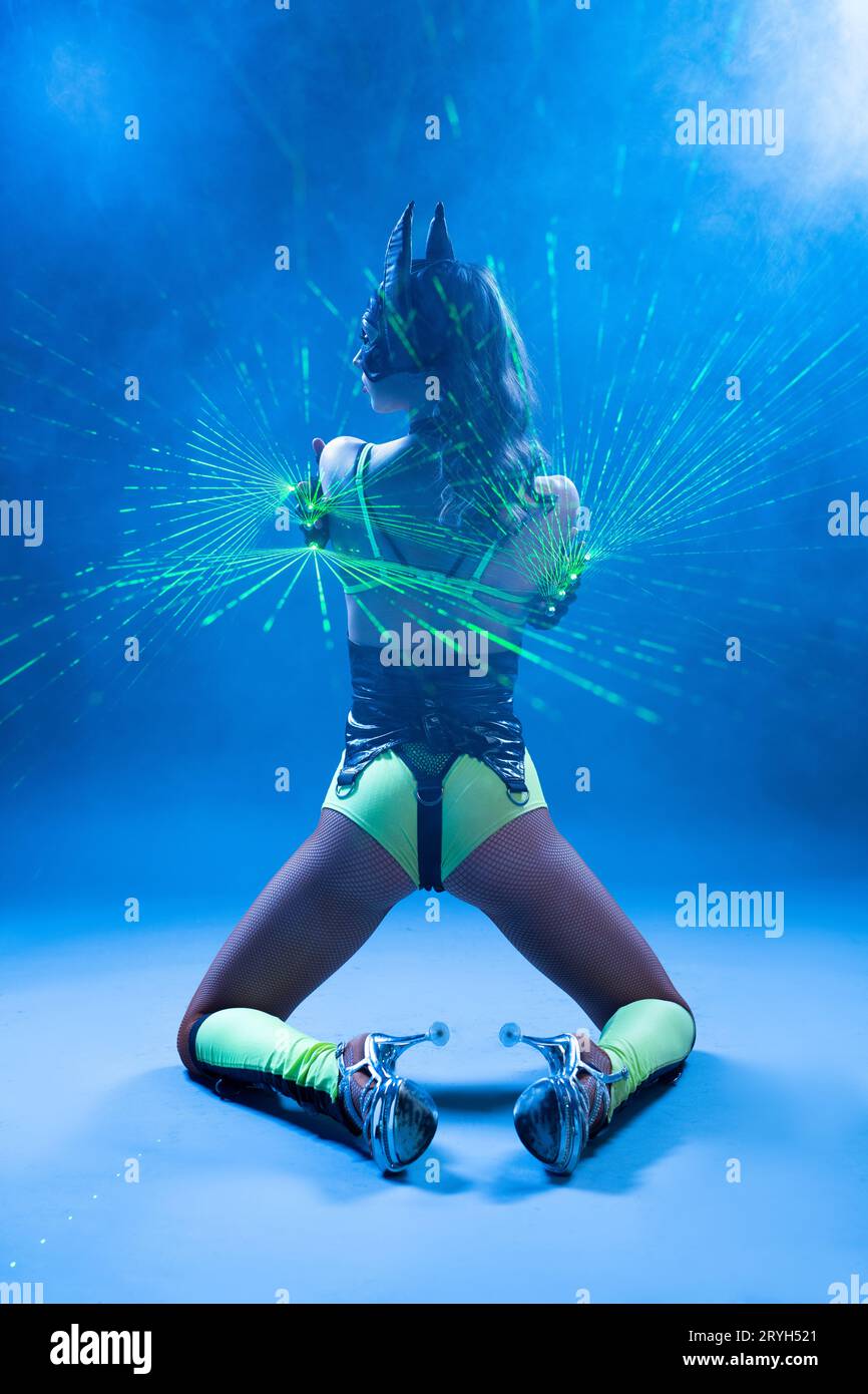 Woman in tight costume with cat ears headband Stock Photo - Alamy