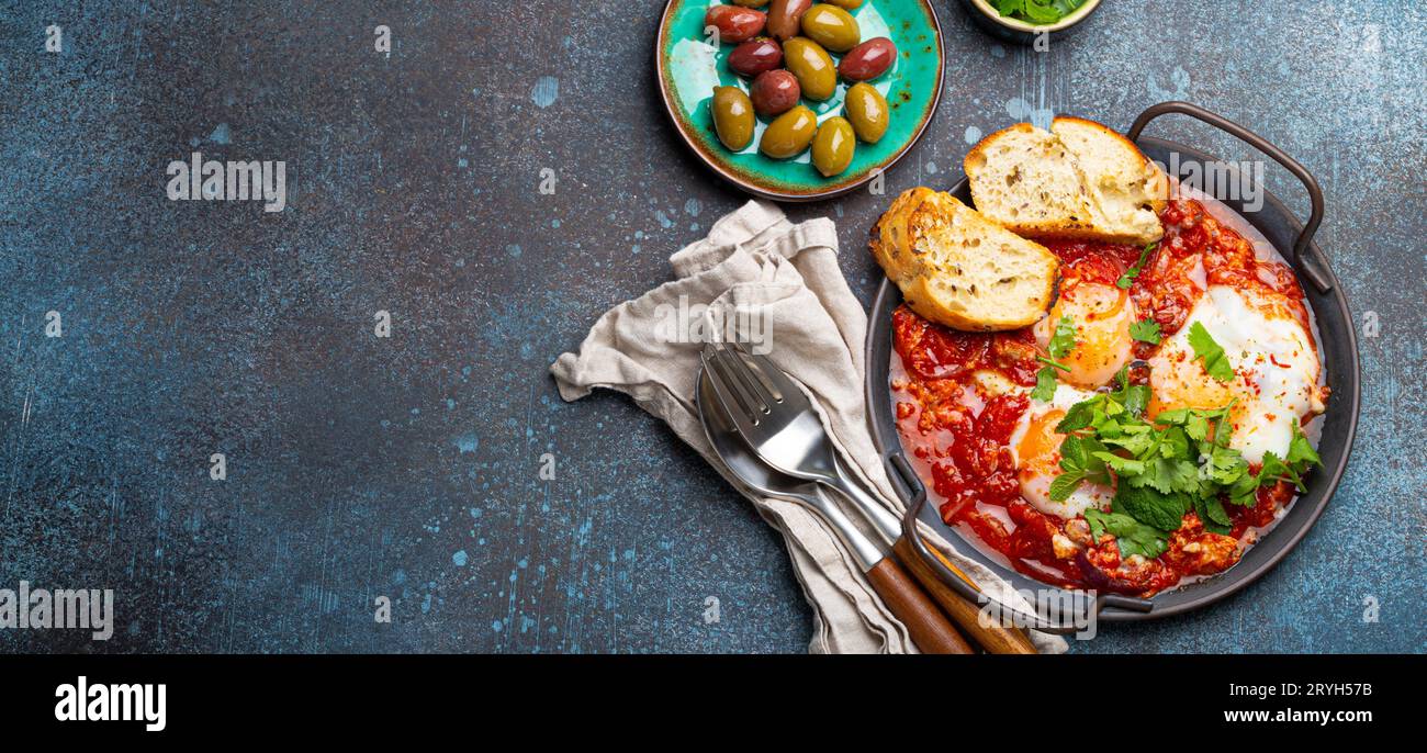 Middle Eastern and Maghrebi healthy dish Shakshouka made of eggs and ...