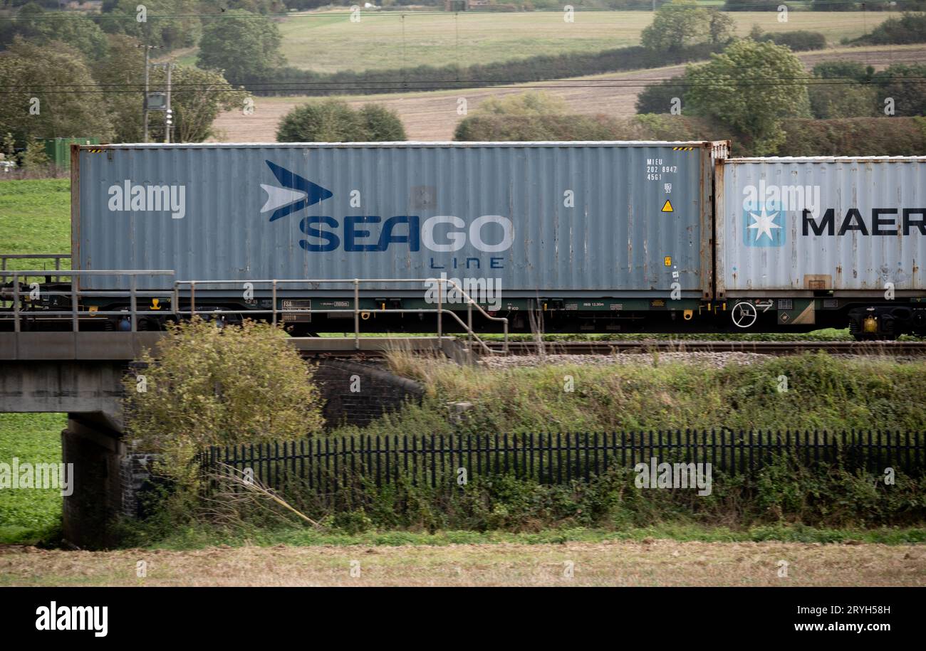 Seago shipping container on a freightliner train, Northamptonshire, UK ...