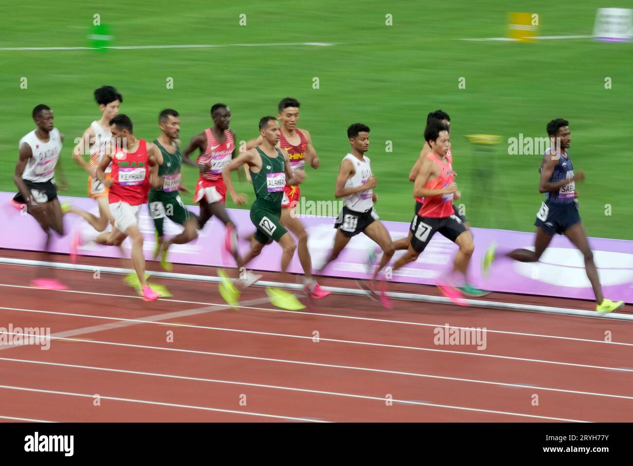 Runners compete during the men's 3000-meter steeplechase final at the 19th Asian Games in ...
