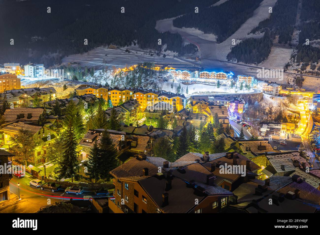 Night photography of beautiful El Tarter town illuminated by street ...