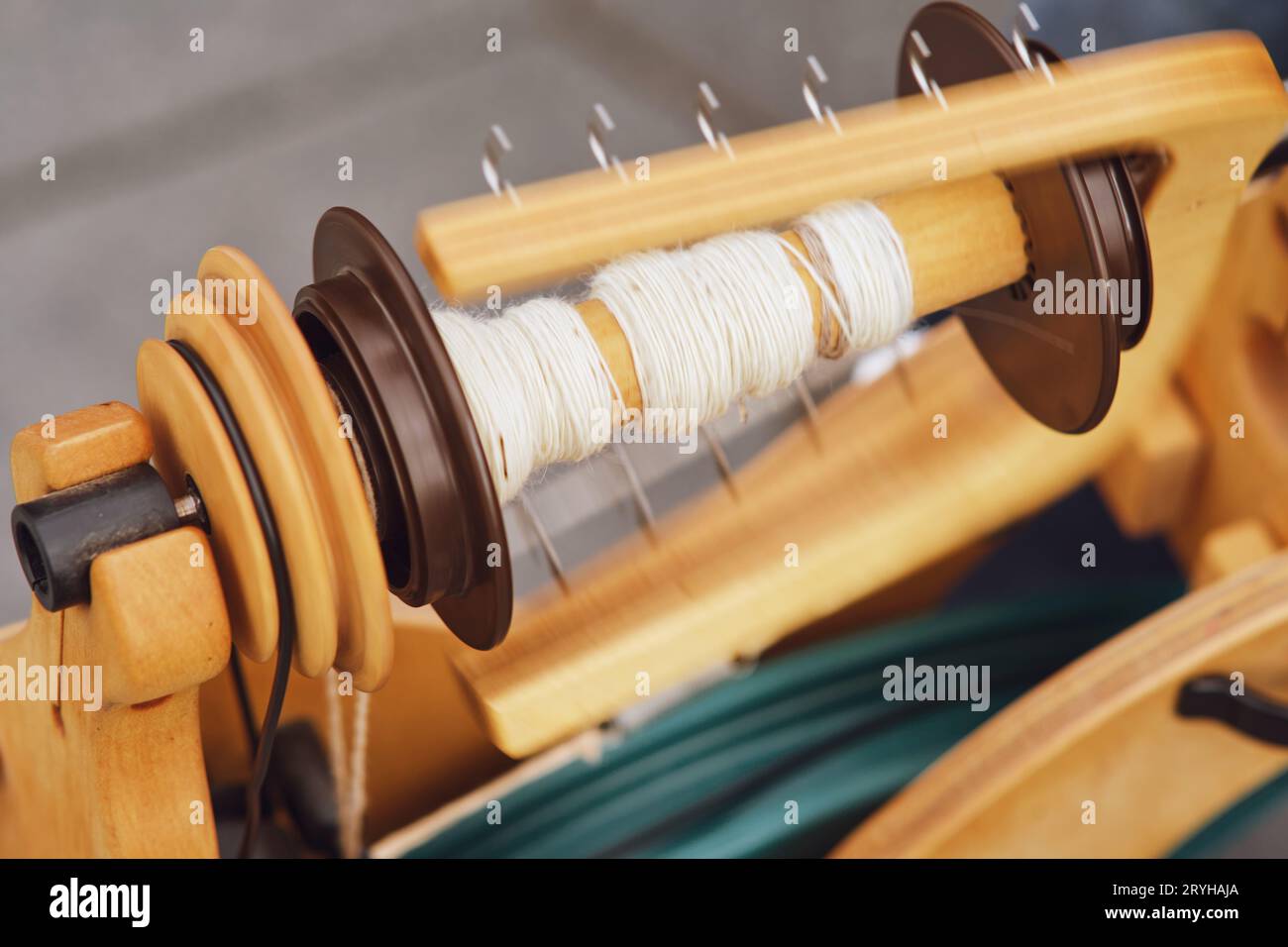 The hand-operated spindle is used for spinning thread Stock Photo - Alamy