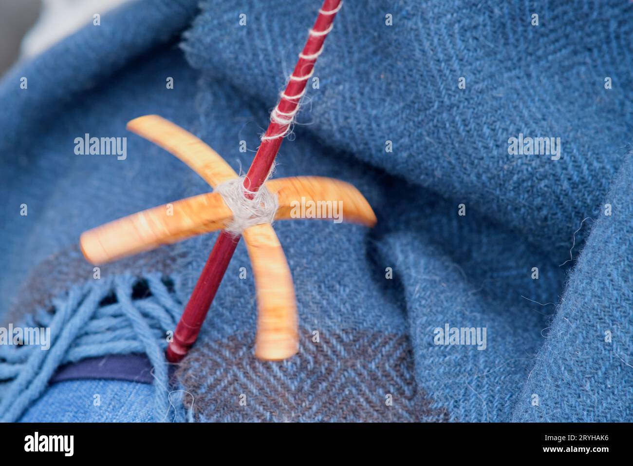 The vintage wooden spindle is a valuable tool for hand spinning and ...