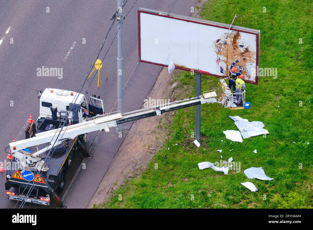 Construction big advertising poster of a new road Stock Photo - Alamy