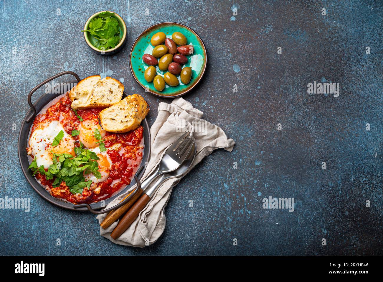 Middle Eastern and Maghrebi healthy dish Shakshouka made of eggs and ...