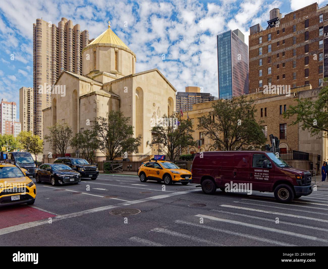 Gold-domed St. Vartan Armenian Apostolic Cathedral rises from a raised ...