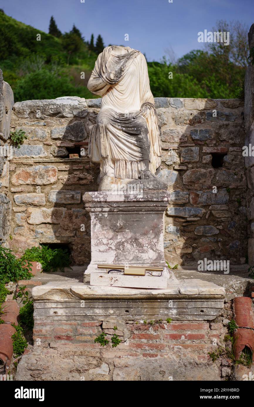 Color image of an ancient headless statue on a pedestal Stock Photo - Alamy