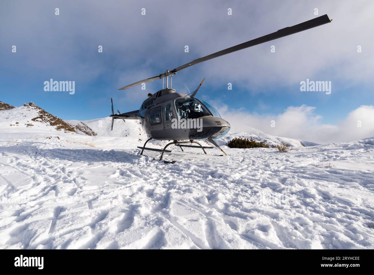 Helicopter on the snow Stock Photo - Alamy