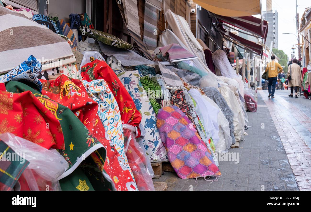 Fabric cloth for sale on street market. Shopping outdoors Stock Photo ...