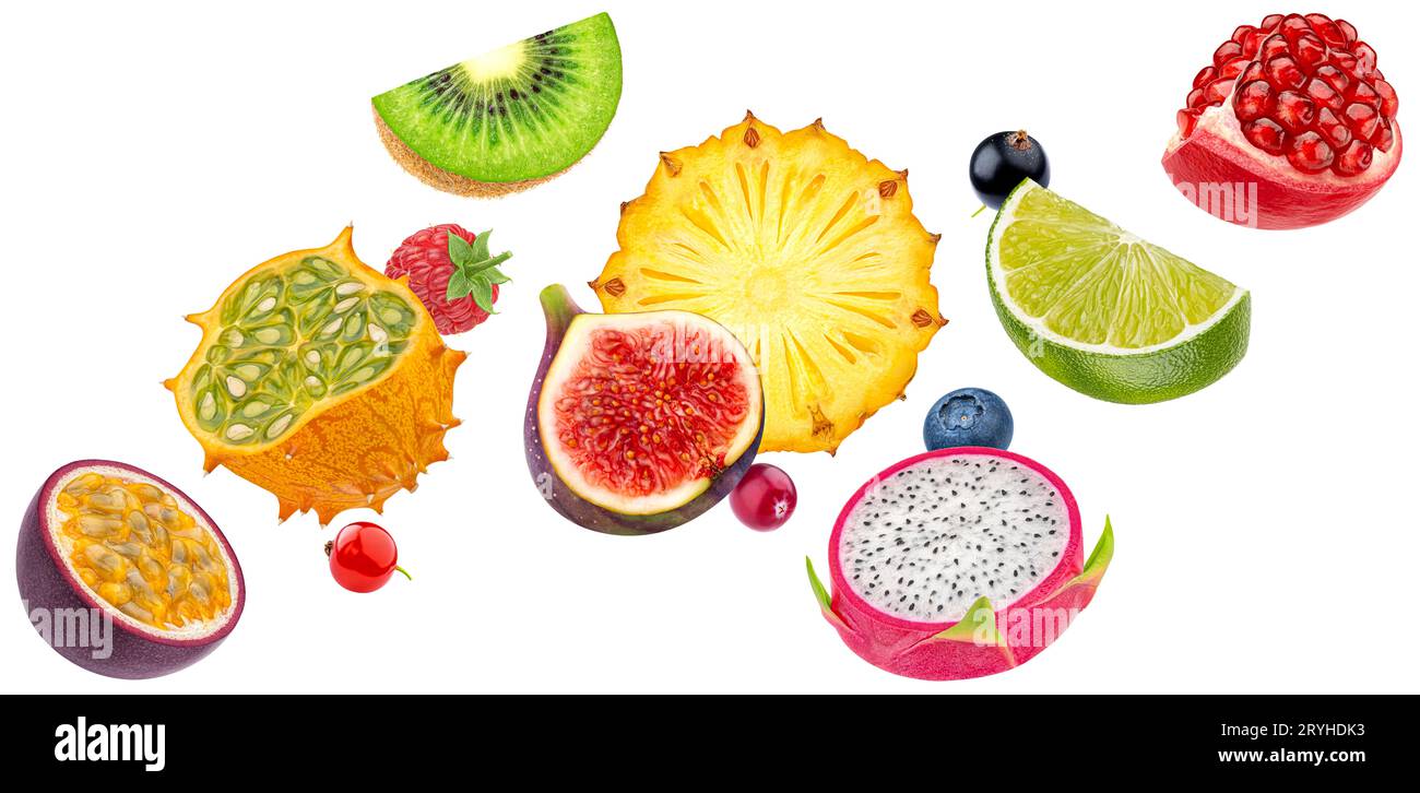 Falling exotic fruit slices isolated on white background Stock Photo - Alamy
