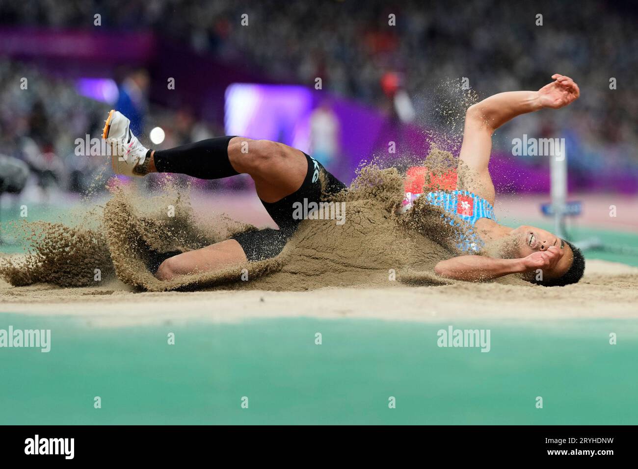 Hong Kong's Chan Ming Tai competes during the men's long jump final at ...