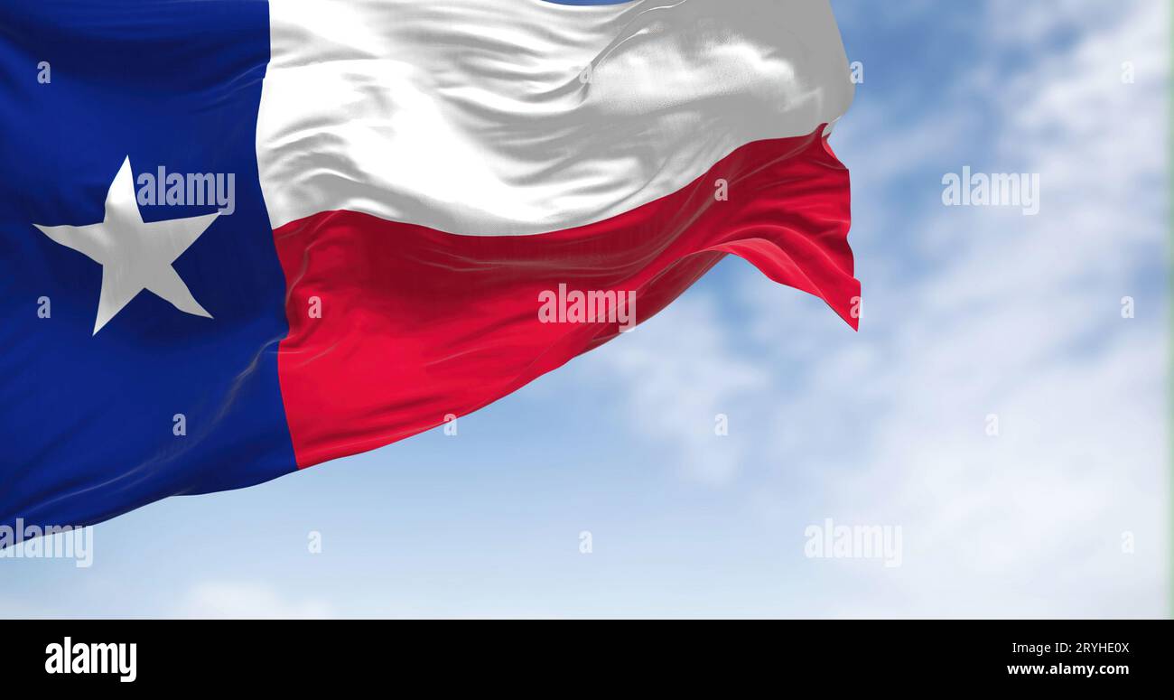 Texas flag flying in the wind hi-res stock photography and images - Alamy